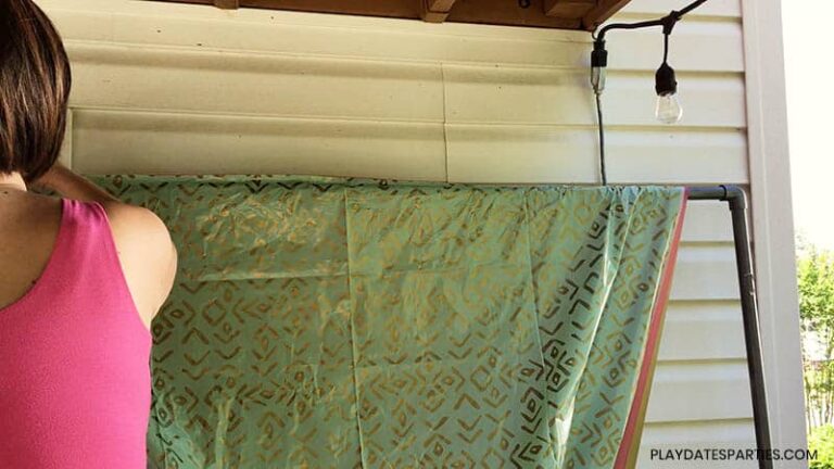 DIY Braided Plastic Tablecloth Party Backdrop