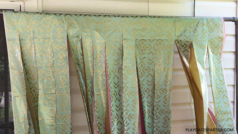 DIY Braided Plastic Tablecloth Party Backdrop