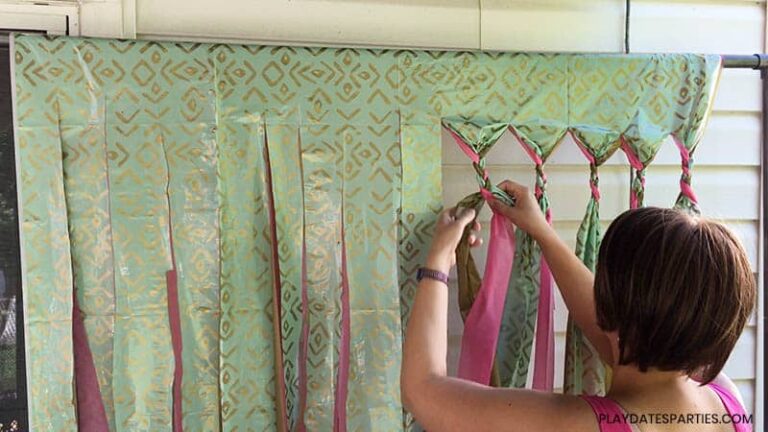 DIY Braided Plastic Tablecloth Party Backdrop