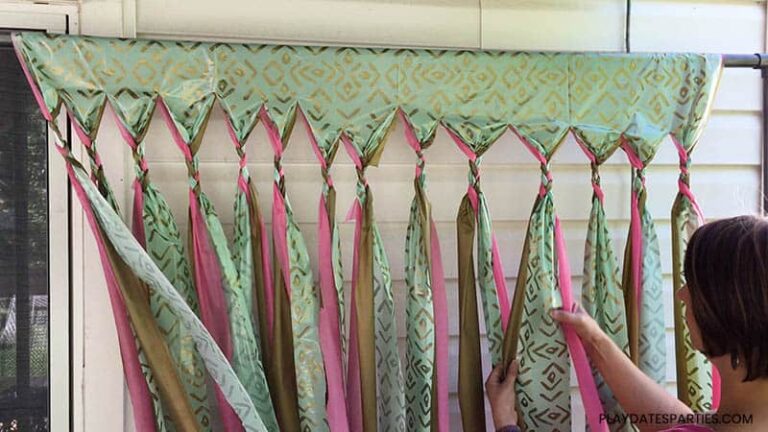 DIY Braided Plastic Tablecloth Party Backdrop